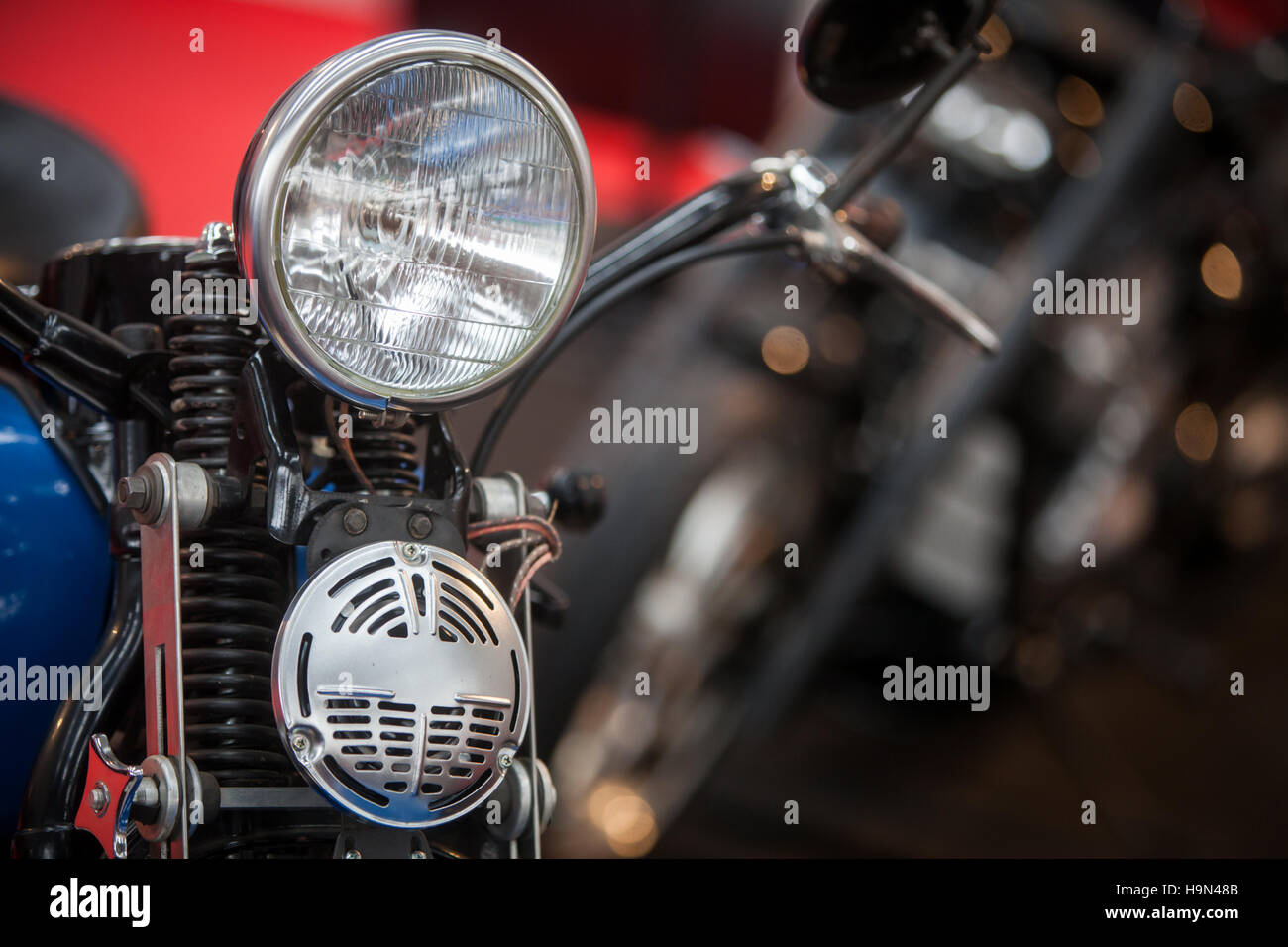 Close up shot of a vintage motorcycle headlight and horn Stock Photo ...