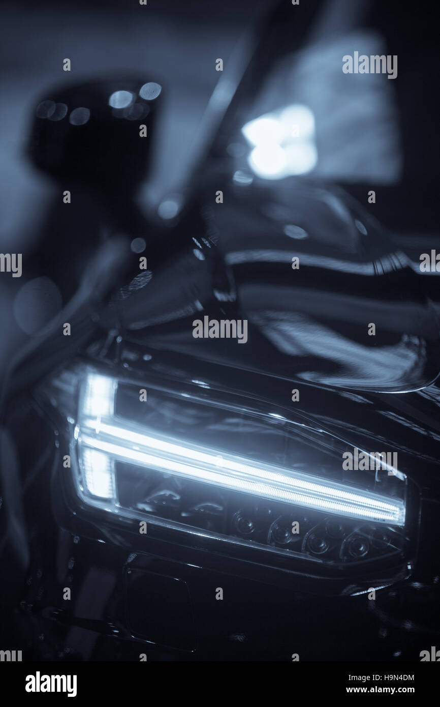 Close up shot of a car's LED headlight Stock Photo - Alamy