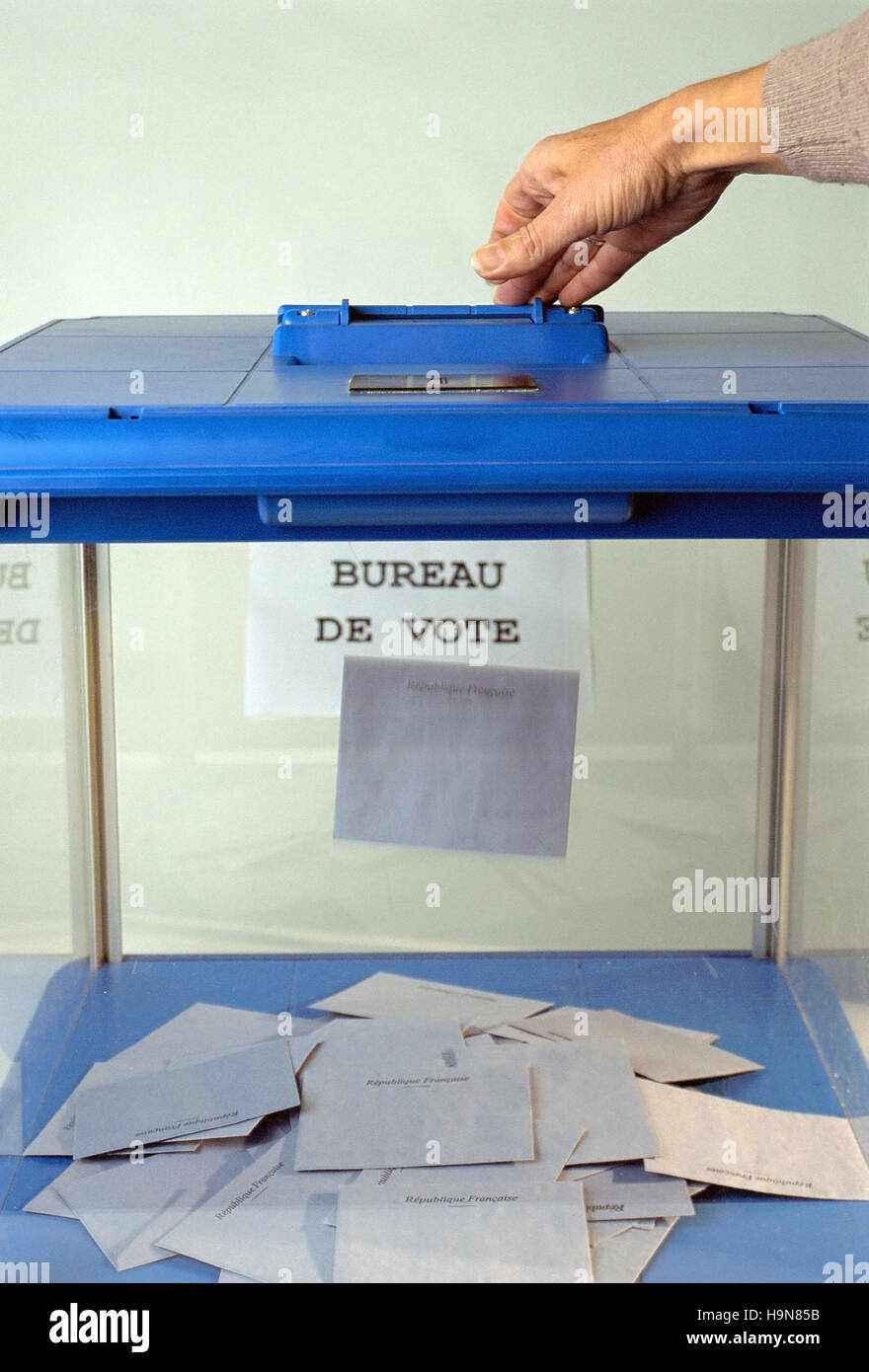 Blue Ballot box of french republic and hand voting with mention of vote ...