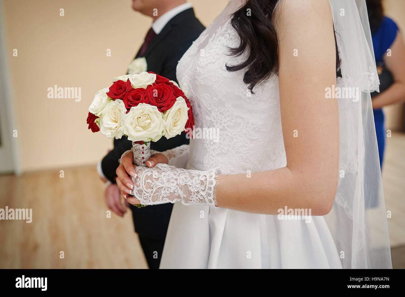 Beautiful red rose in hands hi-res stock photography and images - Alamy