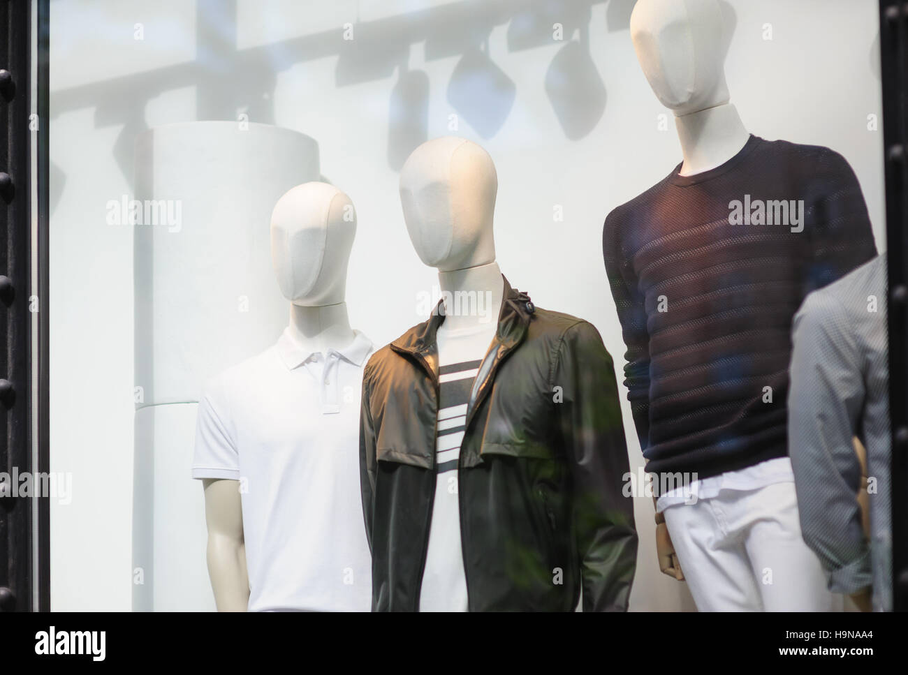 male mannequins in the store window Stock Photo - Alamy