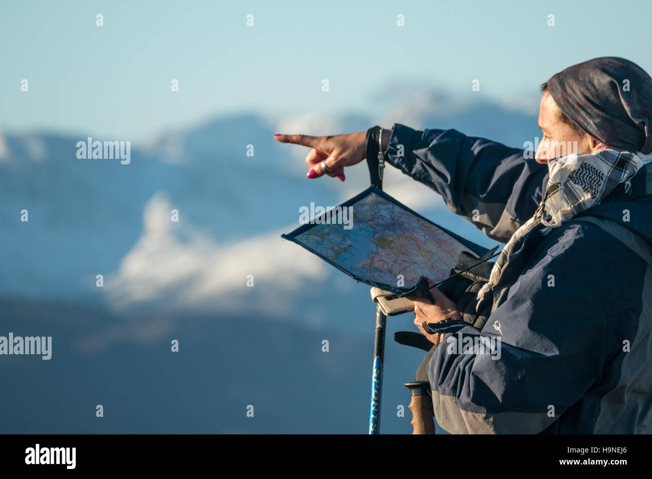 Female pointing at map hi-res stock photography and images - Alamy