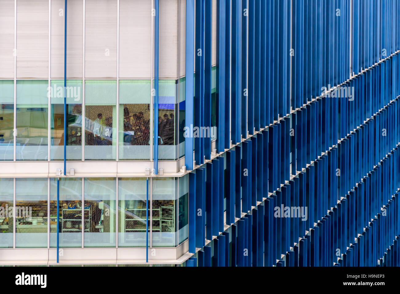Modern office building with blue fin pattern Stock Photo - Alamy