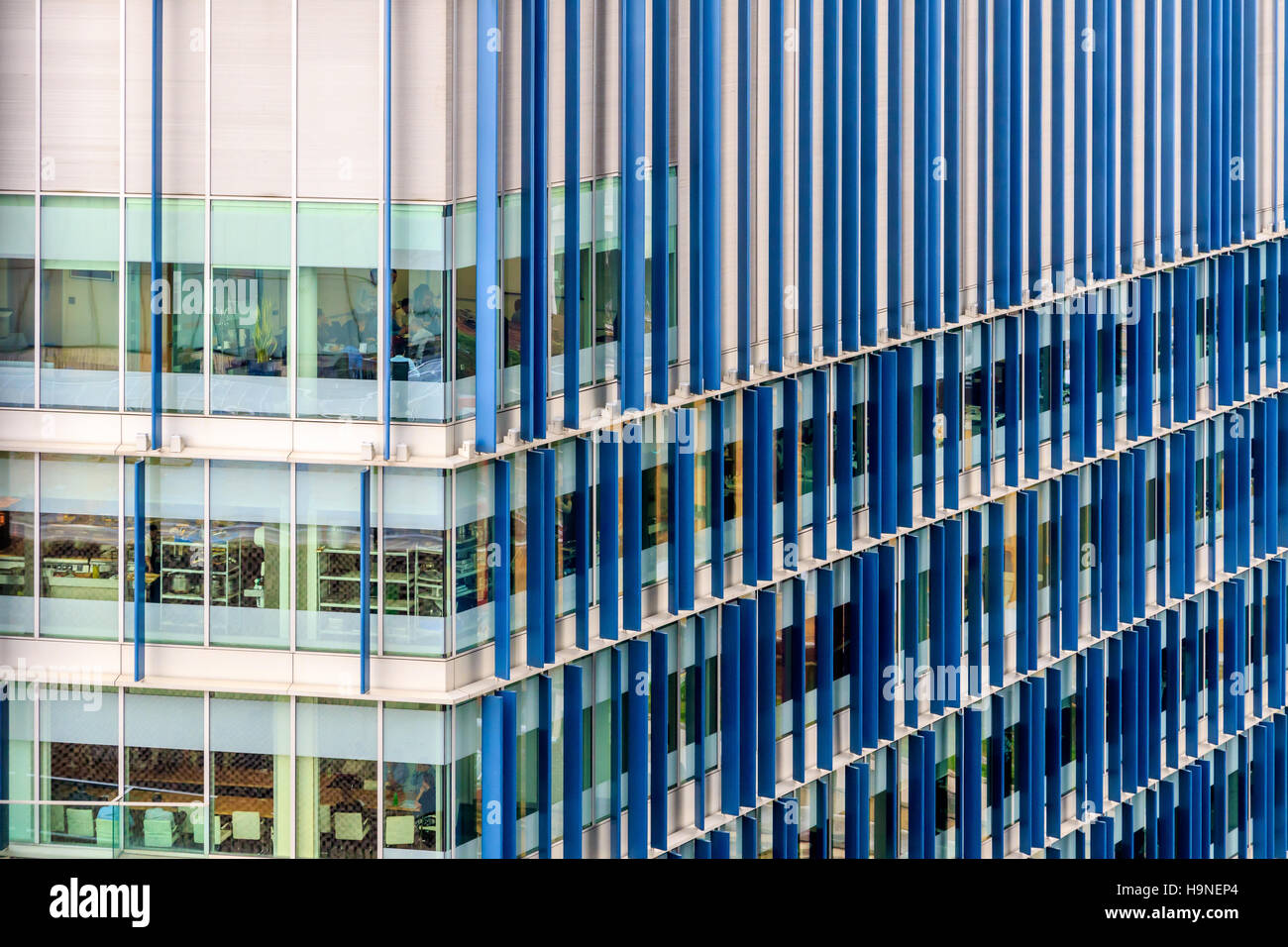 Modern office building with blue fin pattern Stock Photo - Alamy