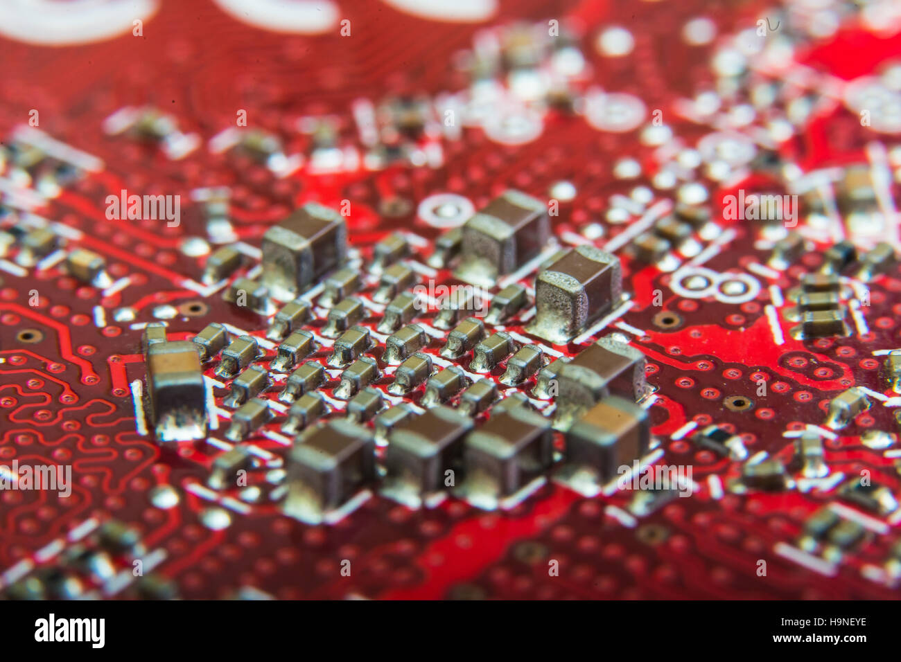 Electronic circuit board close up. Red PCB Stock Photo - Alamy