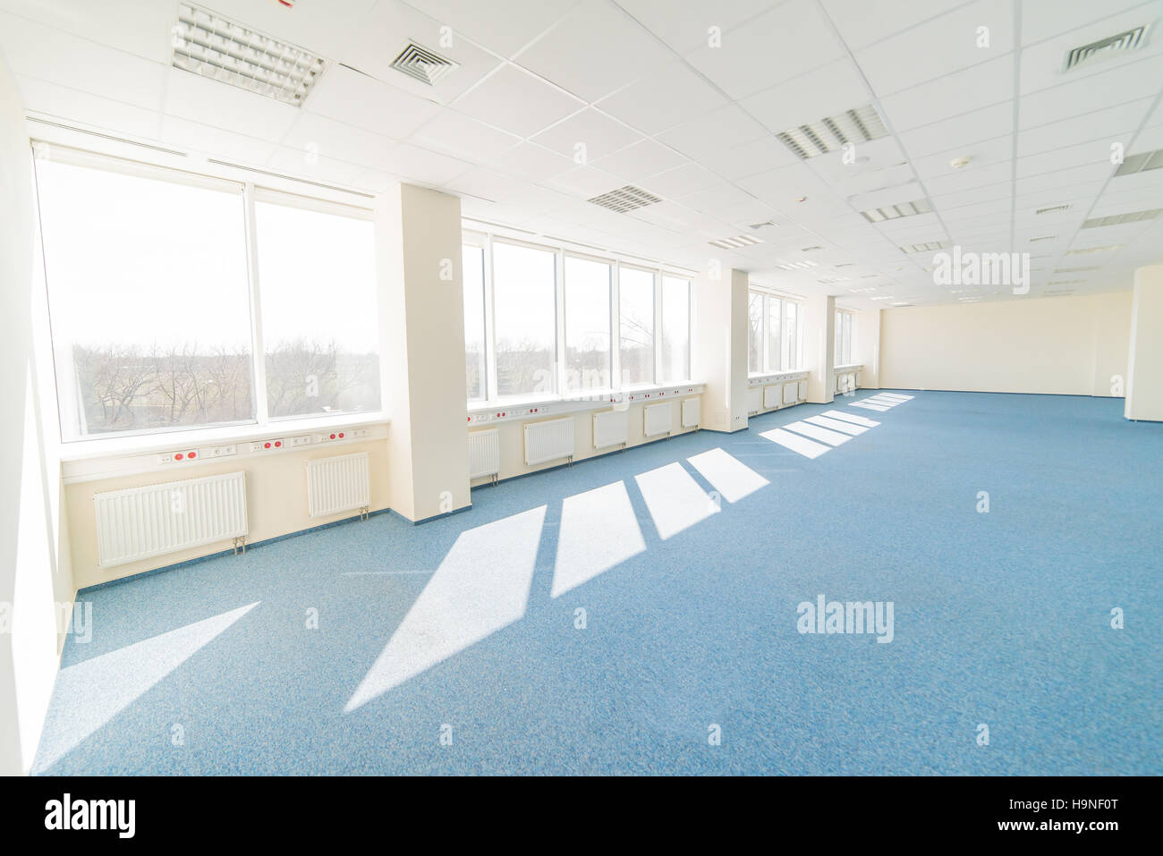 office - openspace - huge glass space-story building Stock Photo - Alamy