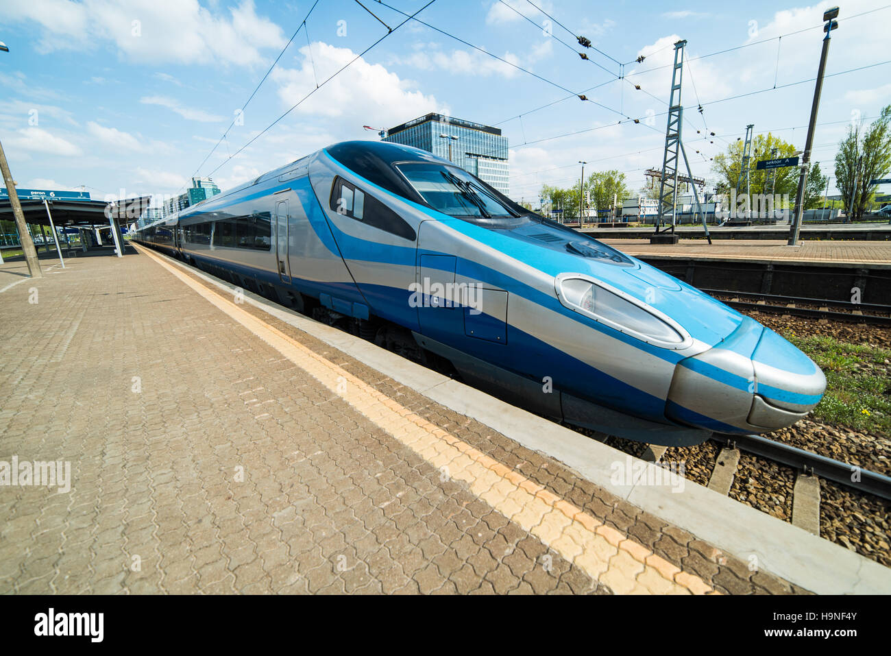 modern train standing at railway station Stock Photo - Alamy
