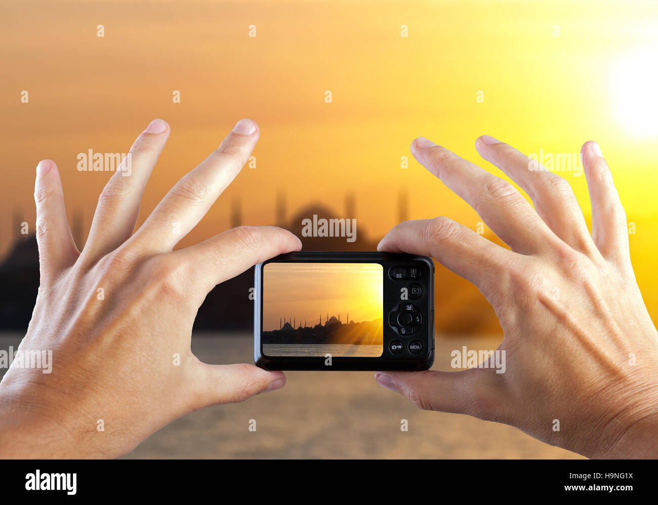 Taking picture with camera Stock Photo - Alamy