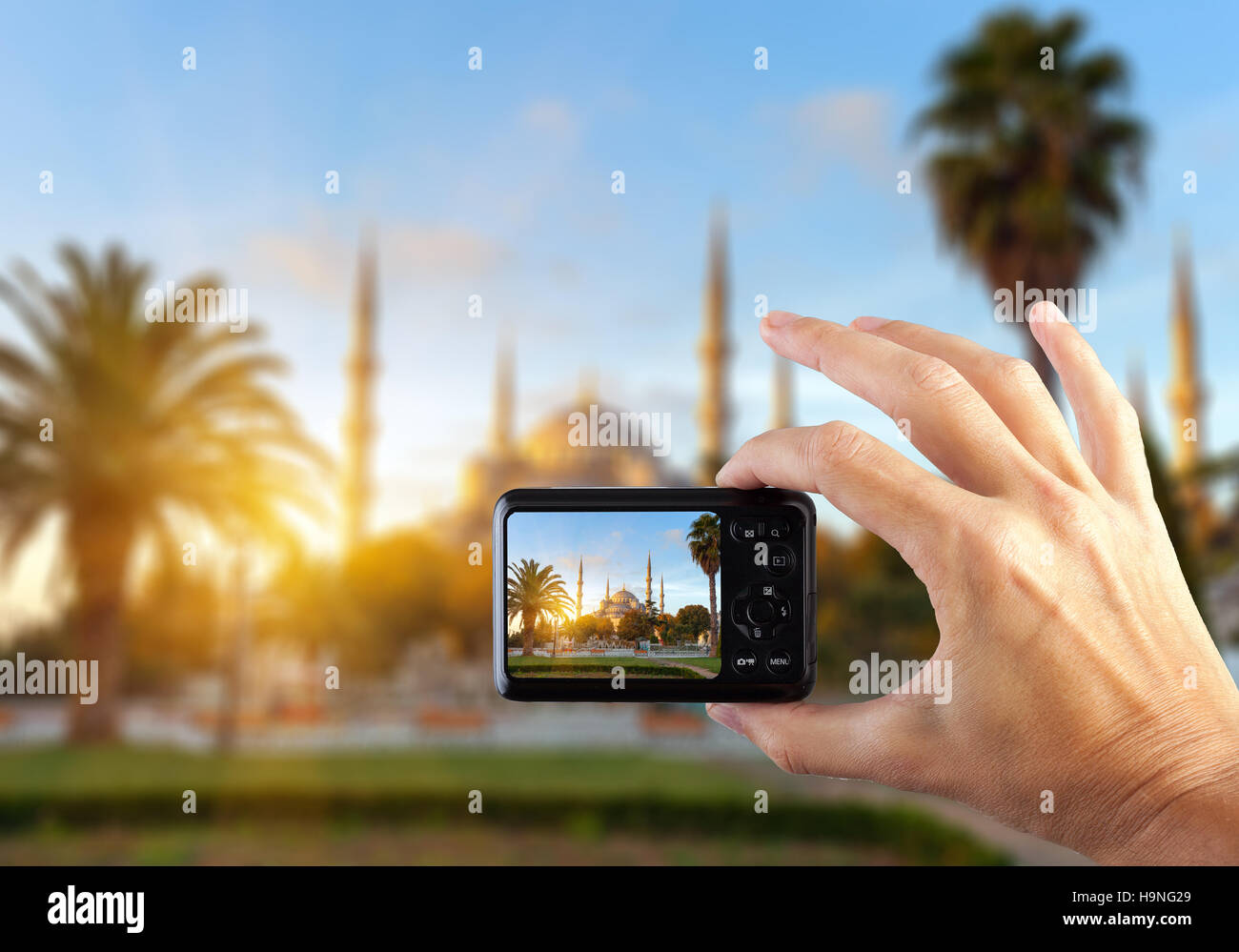 Taking picture with camera Stock Photo - Alamy