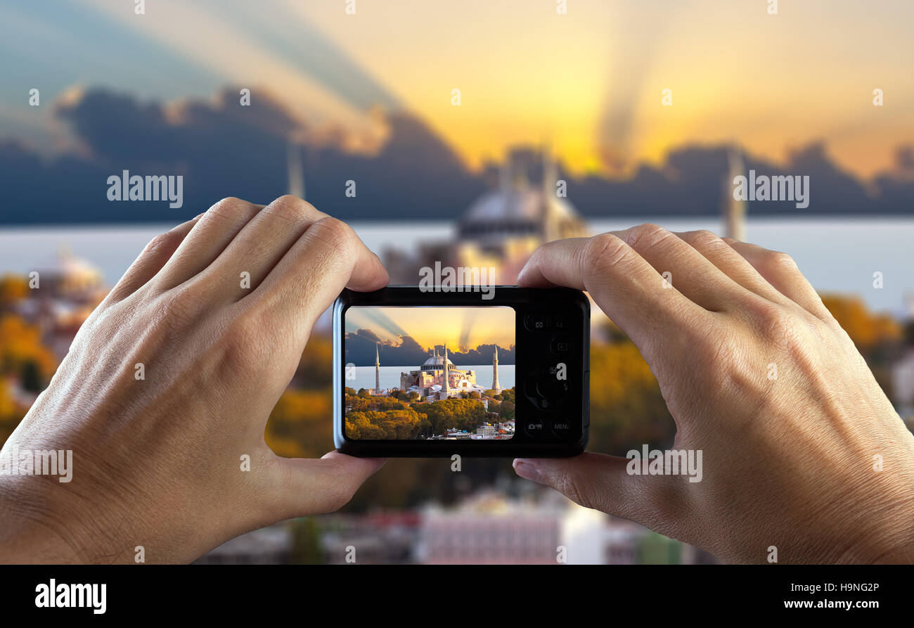 Taking picture with camera Stock Photo - Alamy
