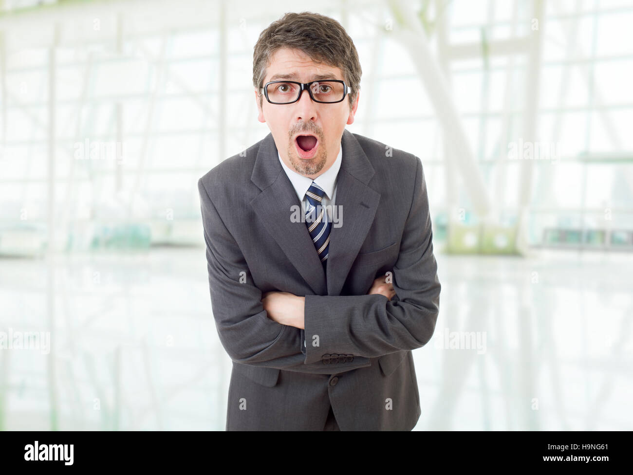 surprised business man surprised at the office Stock Photo - Alamy