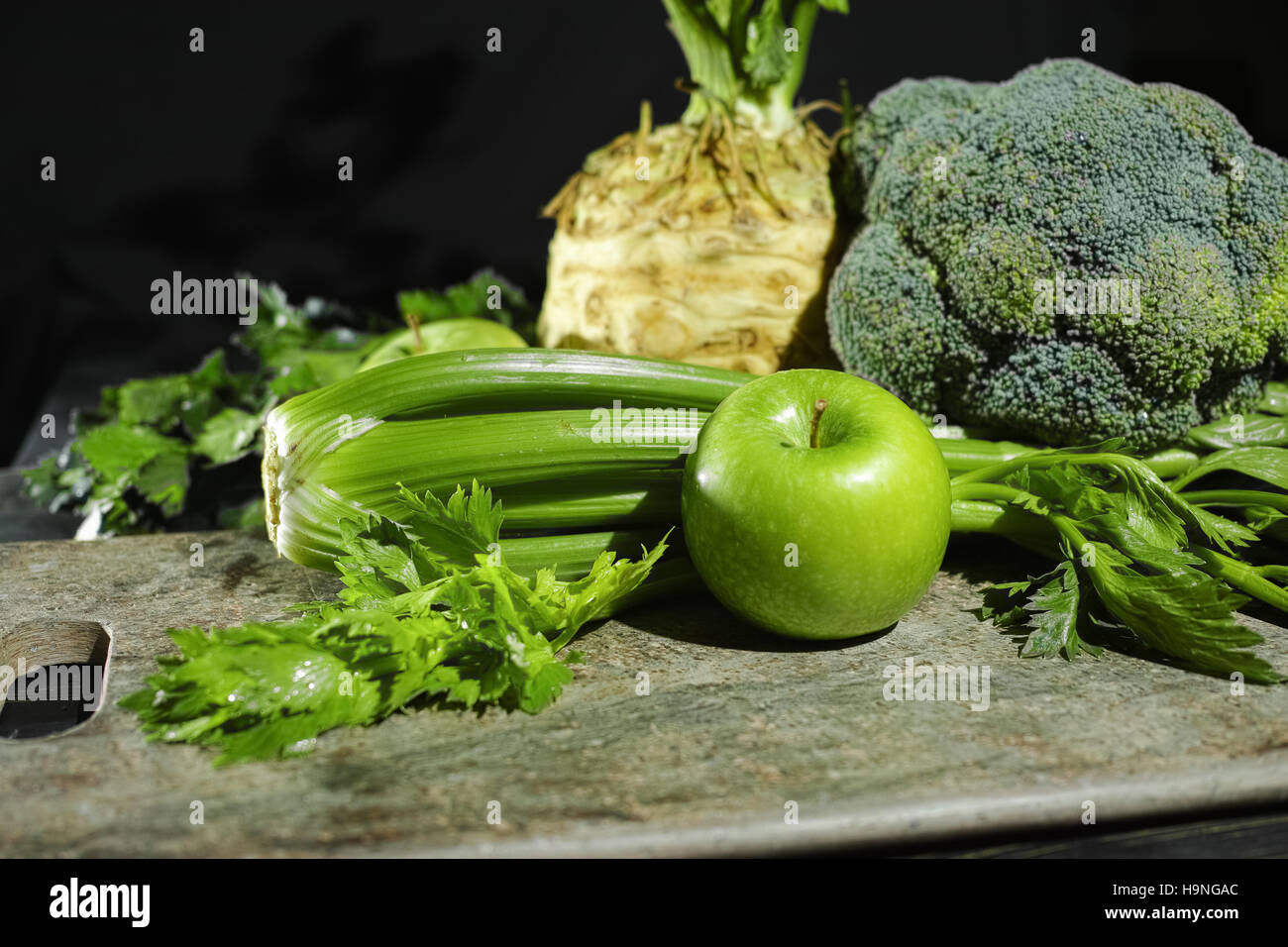 Green vegetables and fruits - celery, apples, celery root celeriac ...