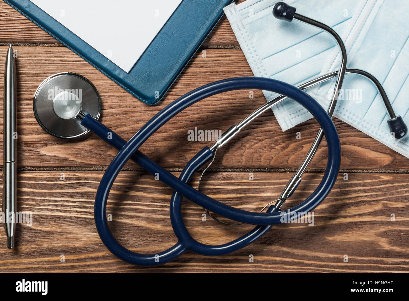 Desk of doctor with medicine things Stock Photo - Alamy