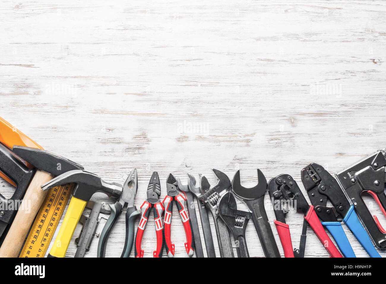 Instruments on wooden table Stock Photo - Alamy