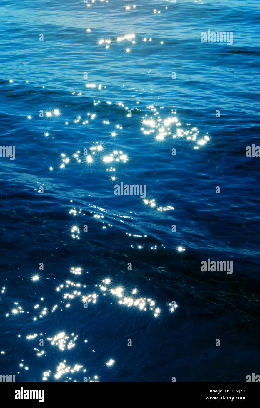 Bright photo of blue transparent sea water Stock Photo - Alamy