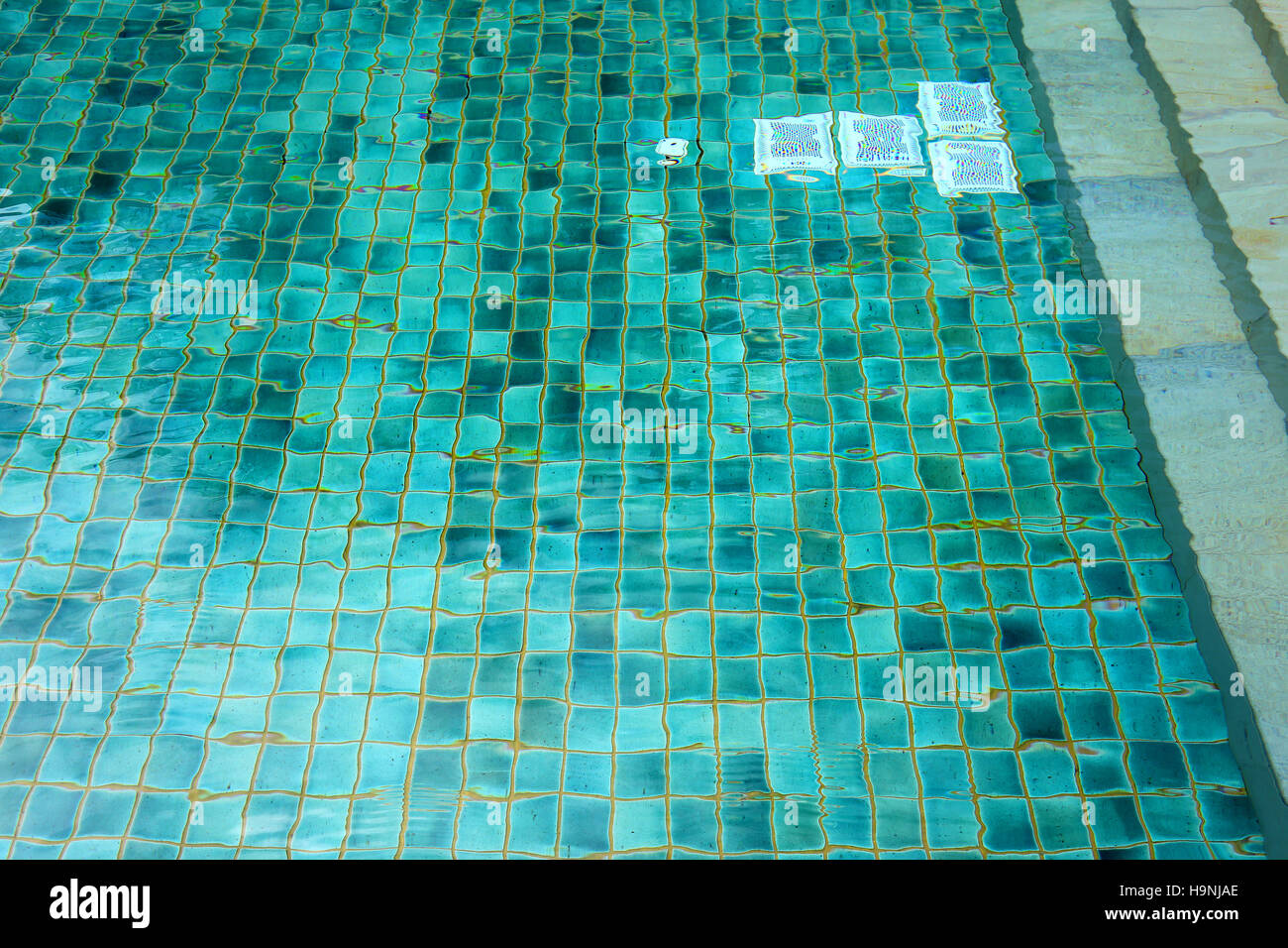 Bright photo of blue transparent pool water Stock Photo - Alamy