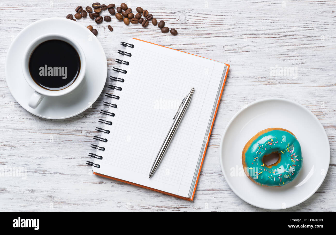 Coffee break with snack Stock Photo - Alamy