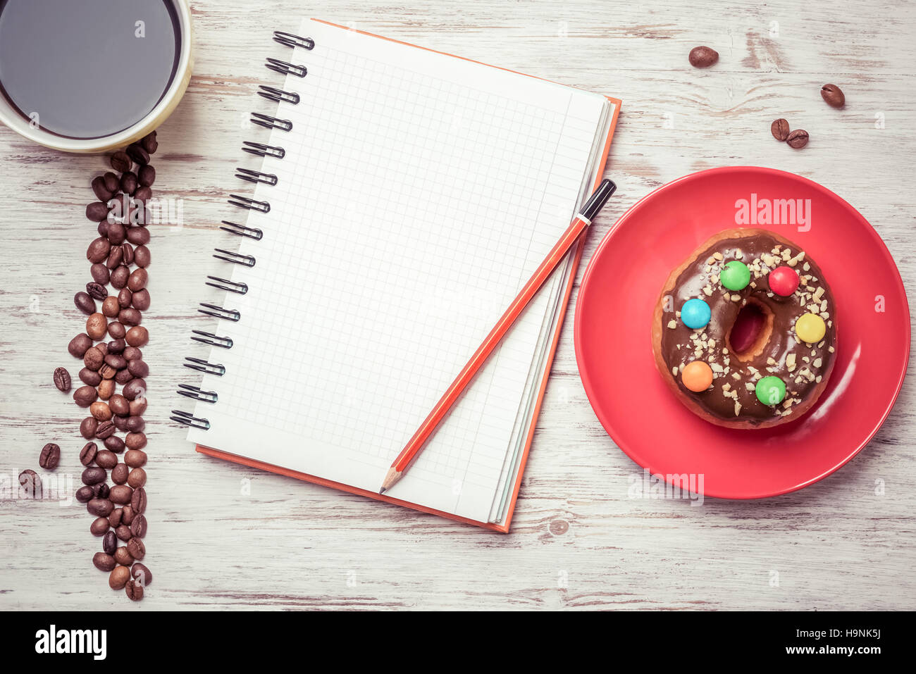 Coffee break with snack Stock Photo - Alamy