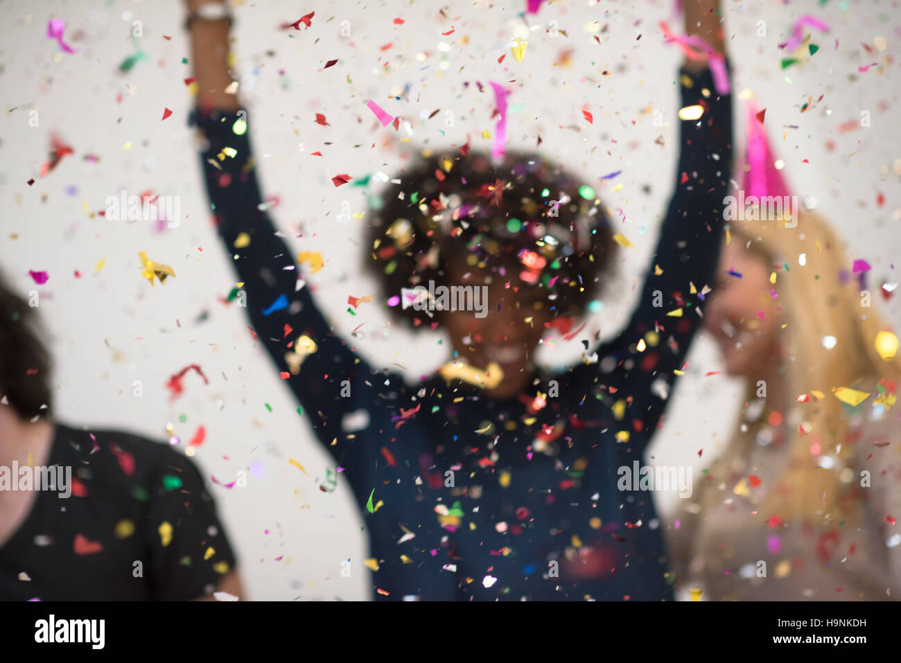 confetti party happy young people group celebrating new year eve while ...