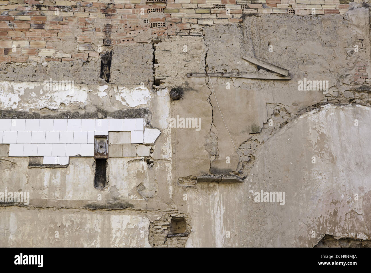 Wall retaining wall destroyed and in ruins, construction and ...