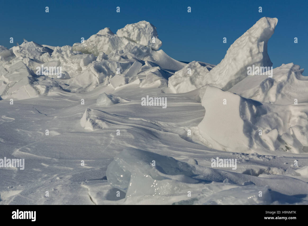 Snow-covered ice hummocks of Lake Baikal Stock Photo - Alamy
