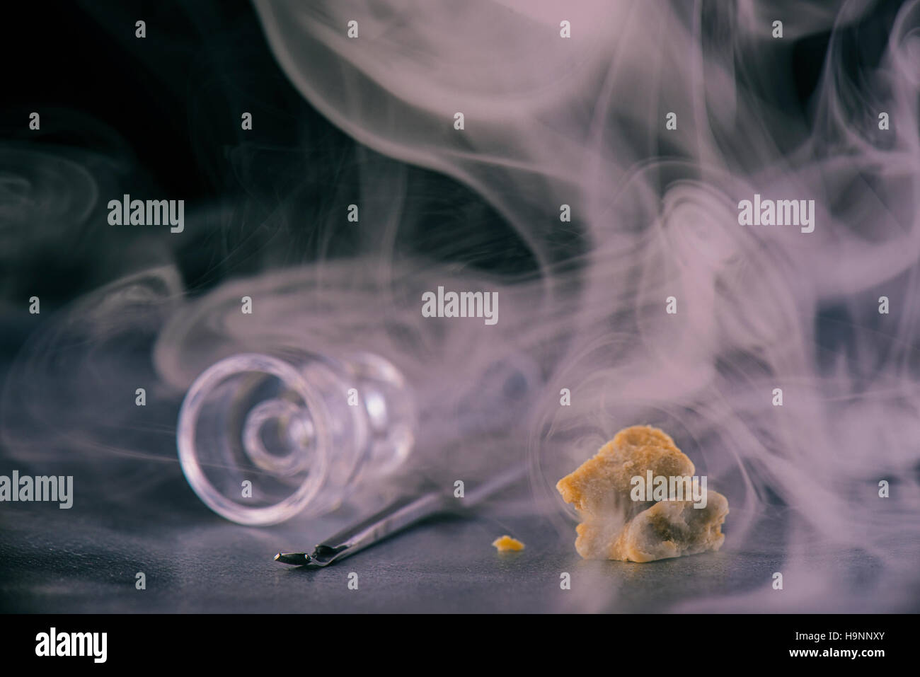 Marijuana extraction concentrate aka wax crumble on dark background ...