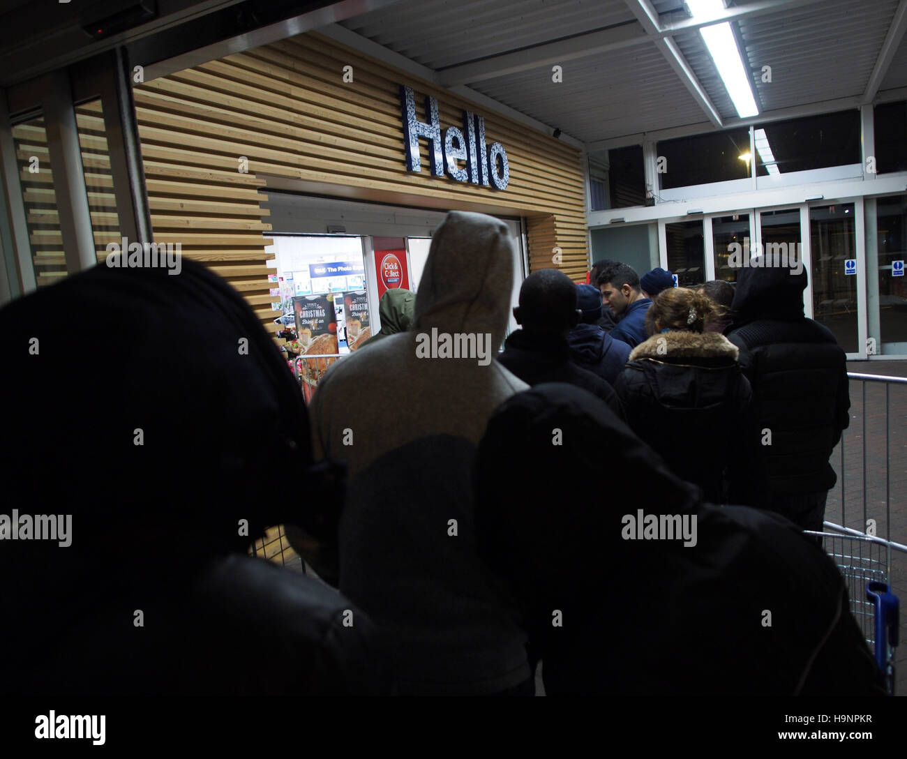 Customers queuing on Black Friday at a Tesco Extra store in Ponders End ...
