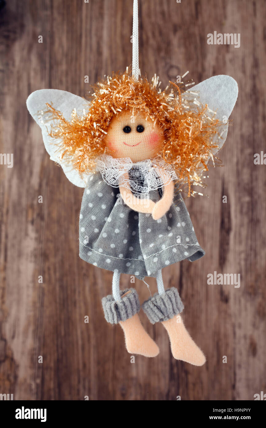 vintage toy angel figurine on wooden table Stock Photo - Alamy