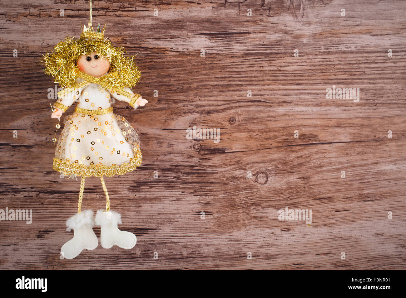 vintage toy angel figurine on wooden table Stock Photo - Alamy
