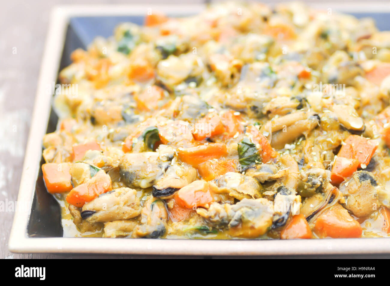 stir-Fried clam or stir-Fried shell with carrot dish Stock Photo - Alamy