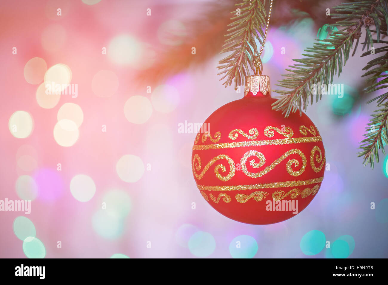red Christmas ball on pine branches Stock Photo - Alamy