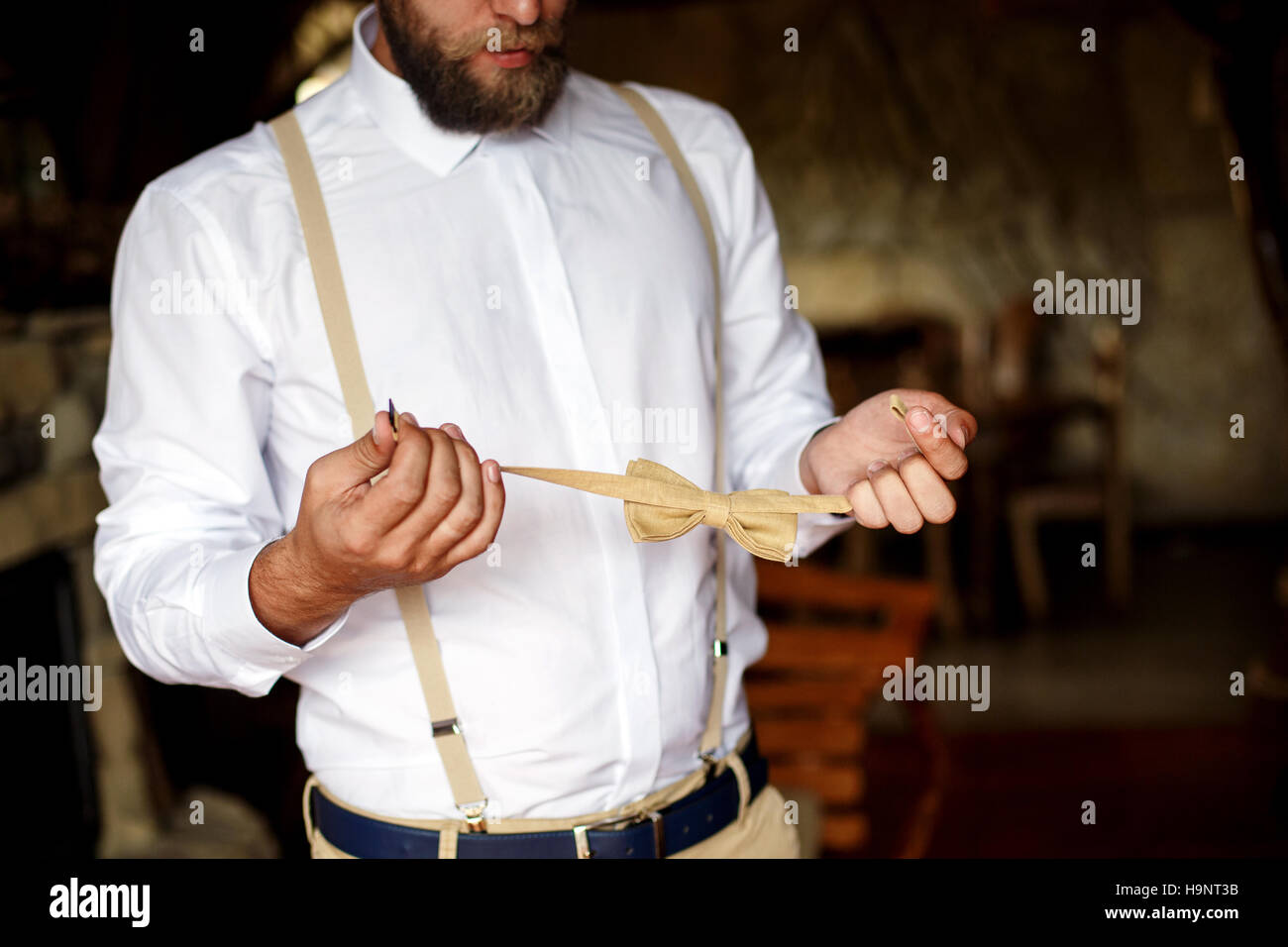groom going to a wedding, wearing bow tie Stock Photo - Alamy