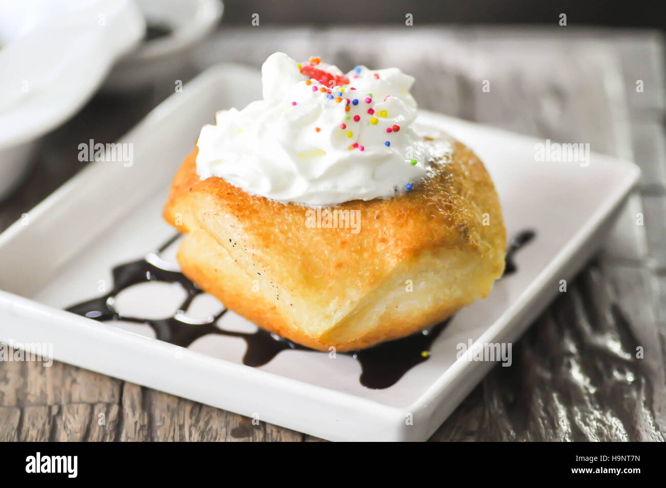 Fried ice cream and whipped cream topping dish Stock Photo - Alamy