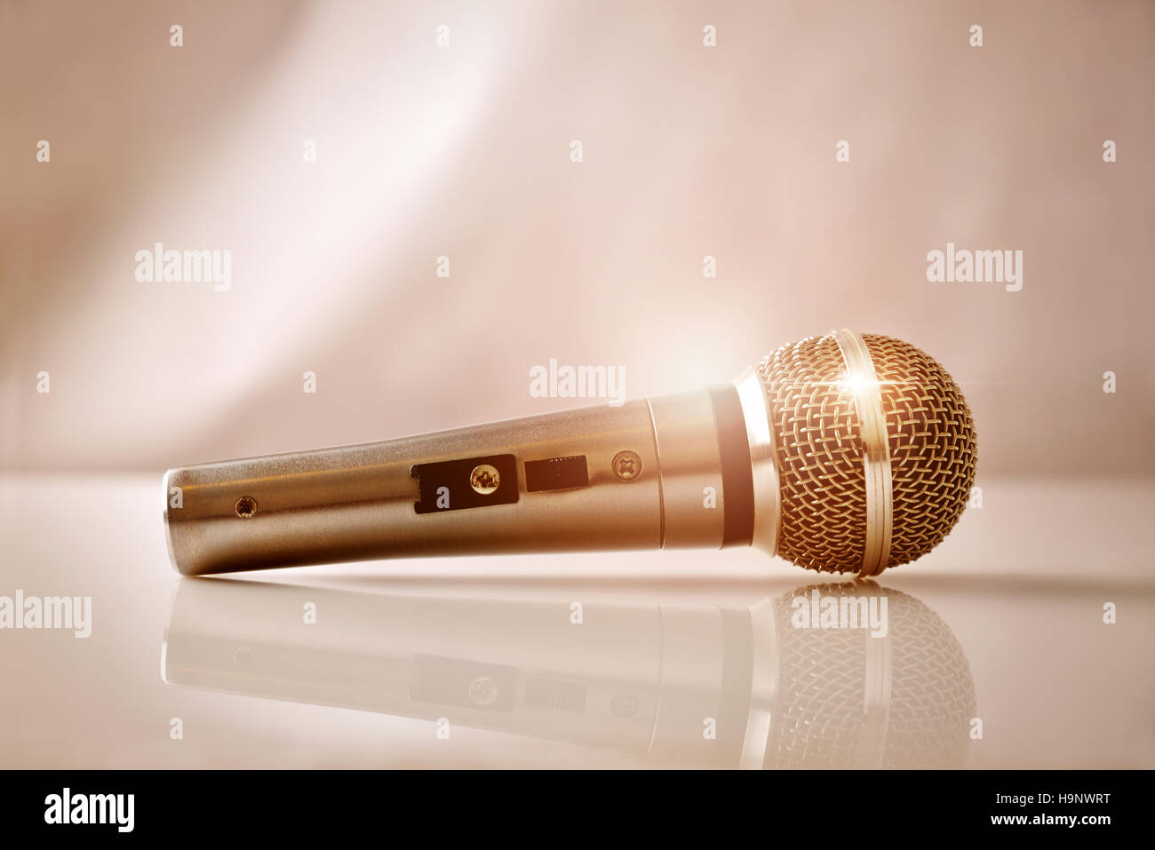Golden mic hi-res stock photography and images - Alamy