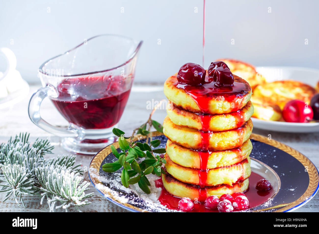 Delicious cottage cheese pancakes with cherry jam and cranberries ...