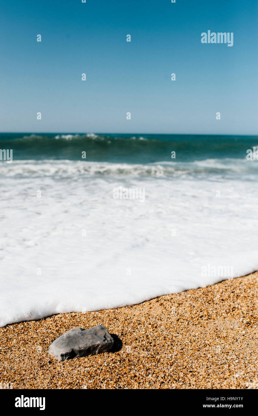 French coast line with a rock in the sands Stock Photo - Alamy