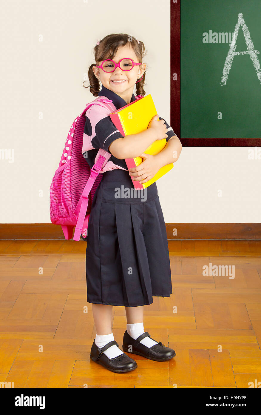 Beautiful girl wearing school uniform hi-res stock photography and ...