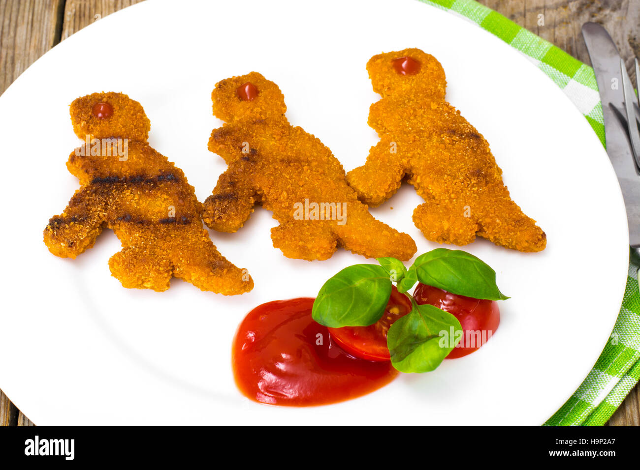 Fish nuggets for kids Dinosaurs Stock Photo - Alamy