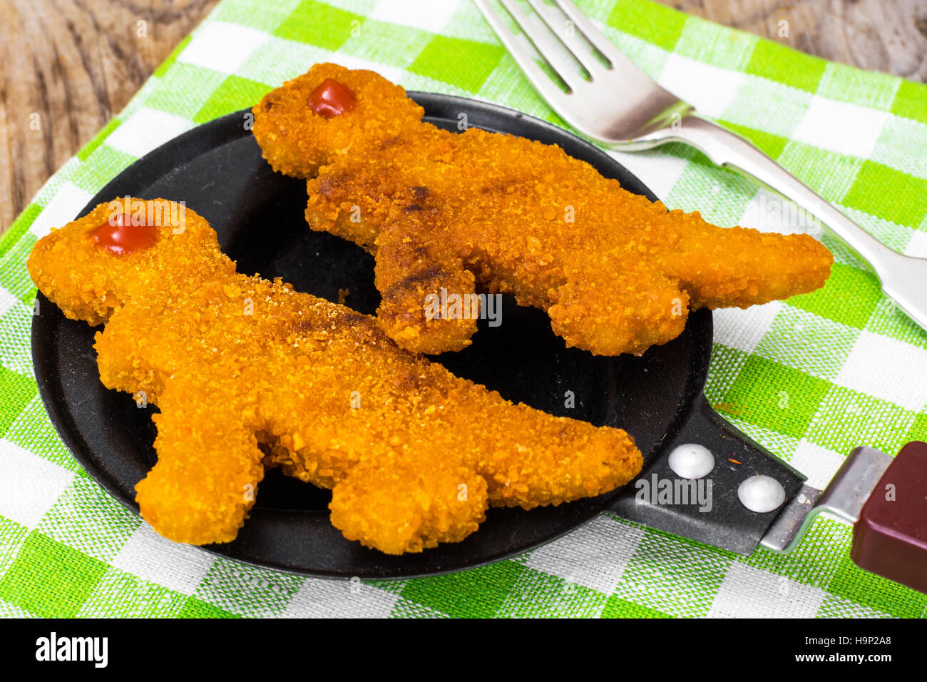 Fish nuggets for kids Dinosaurs. Studio Photo Stock Photo - Alamy