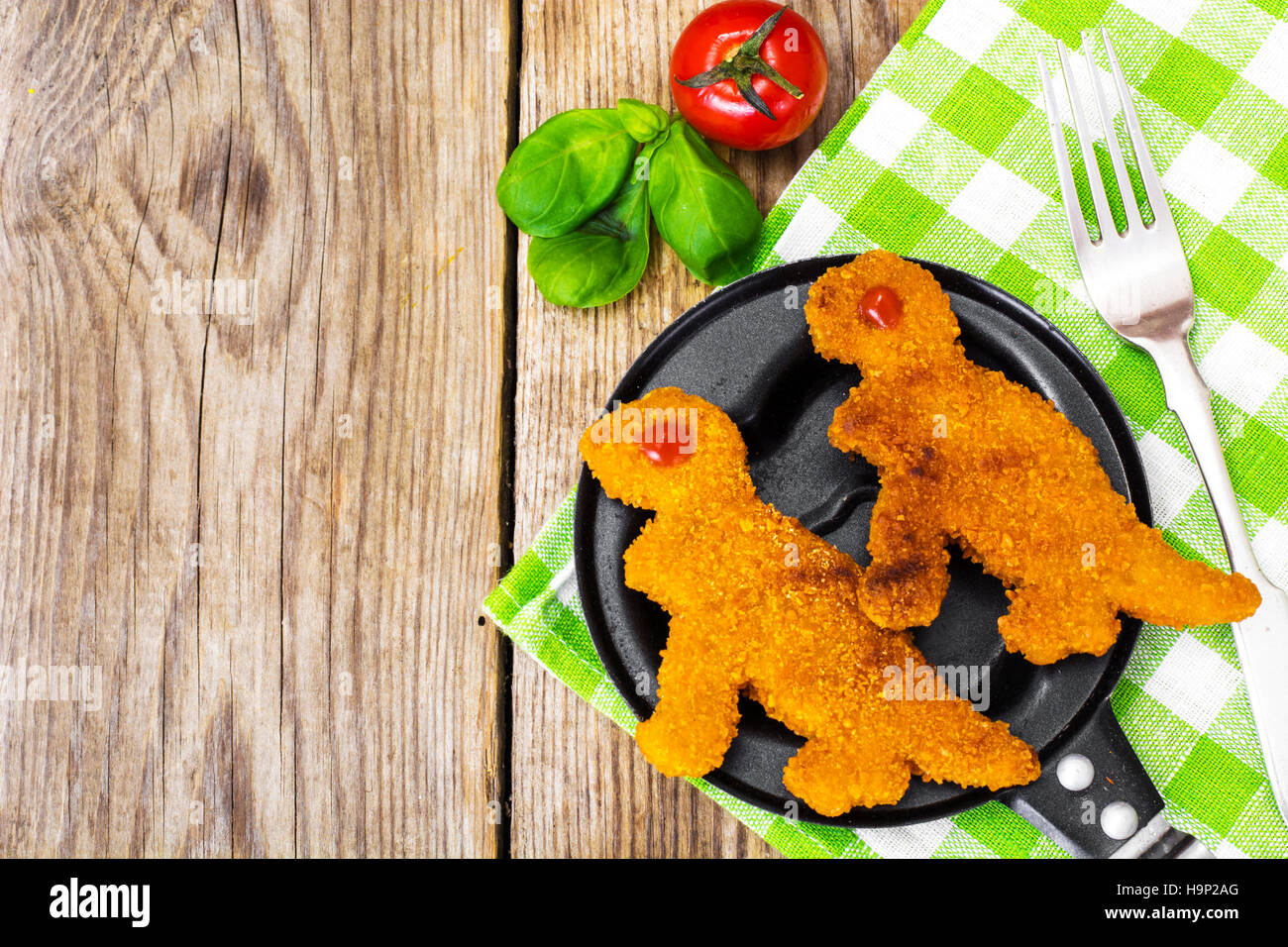 Fish nuggets for kids Dinosaurs. Studio Photo Stock Photo - Alamy