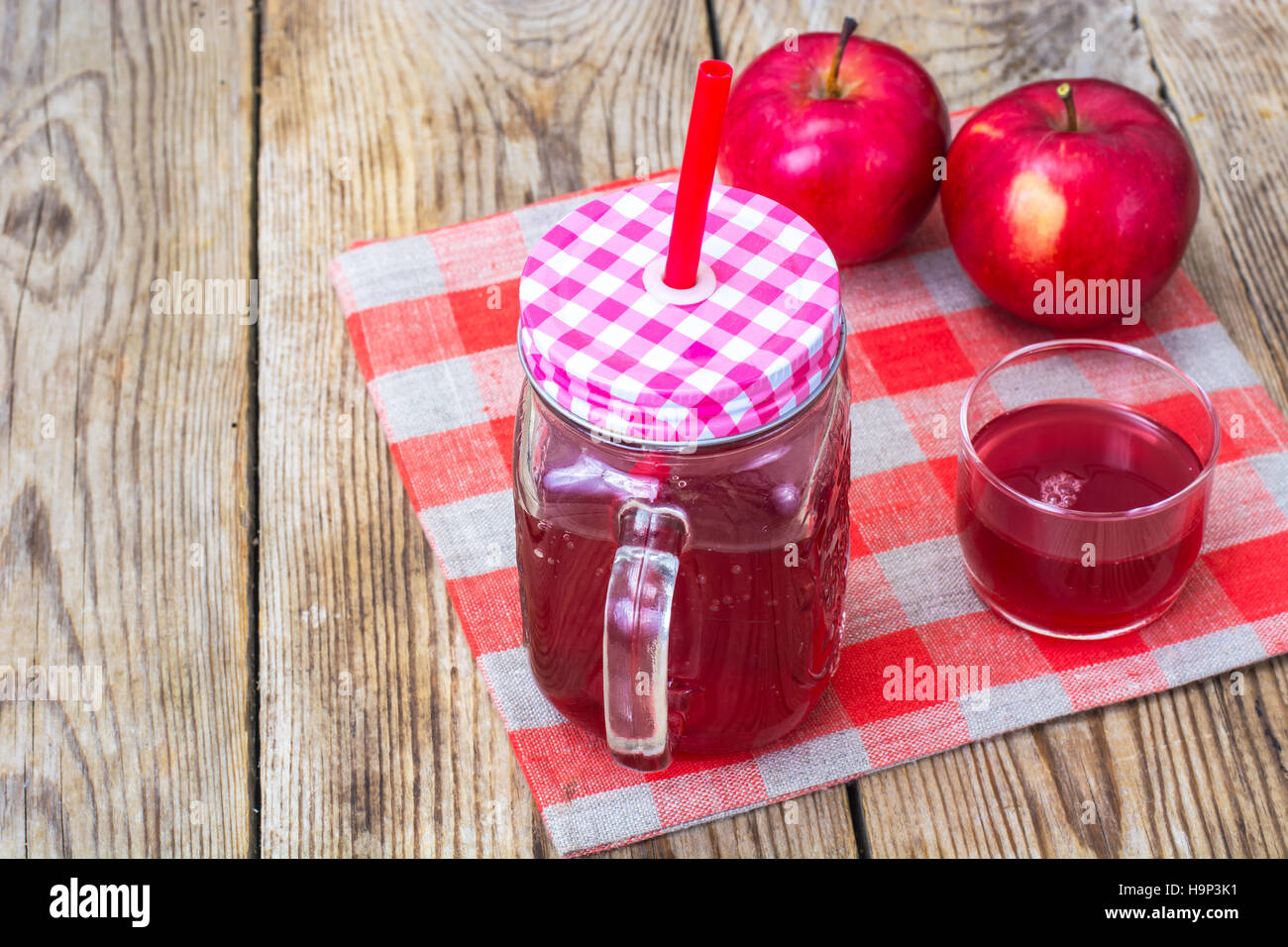 Natural juice of pomegranate and red apples. Stidio Photo Stock Photo ...