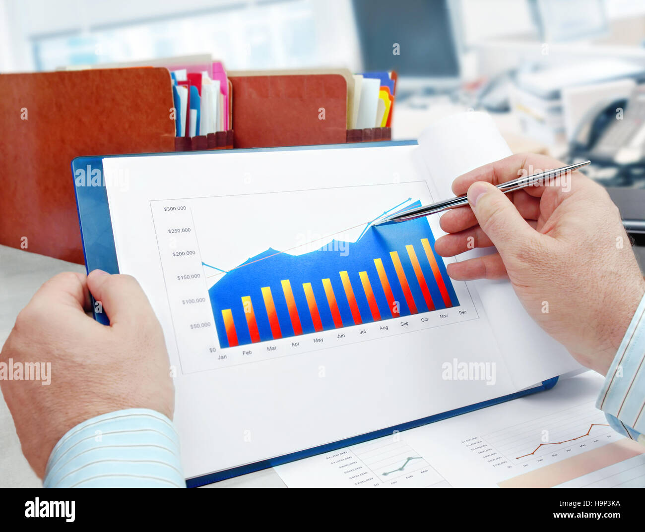 Analyzing Investment Charts Stock Photo - Alamy