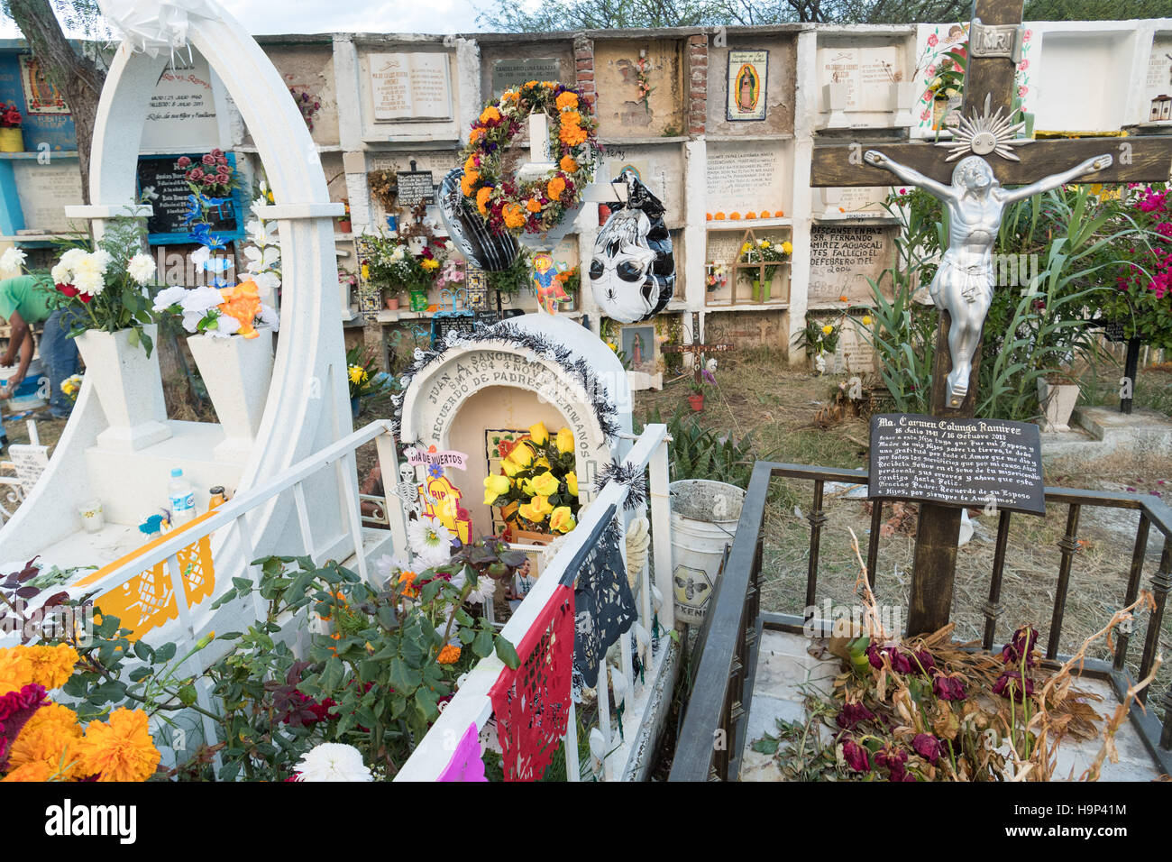 Graves decorated with flowers, balloons and flags in the Nuestra Se–ora ...