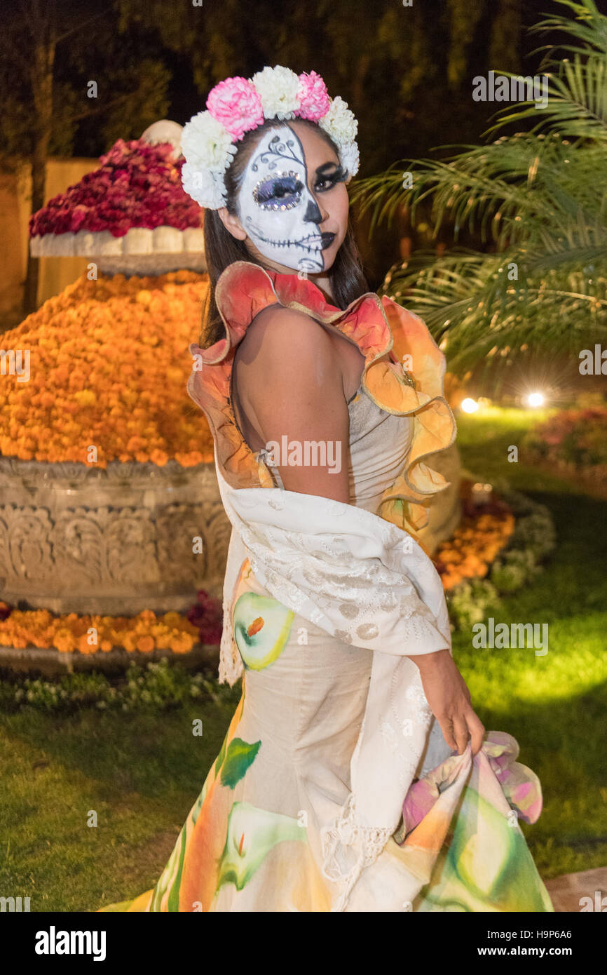 A woman dressed as La Calavera Catrina poses during the Day of the Dead ...