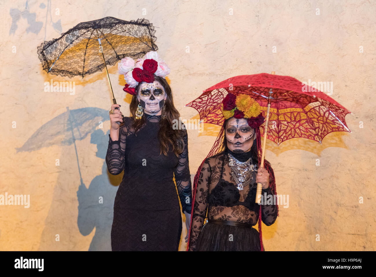Two women dressed as La Calavera Catrina pose during the Day of the ...