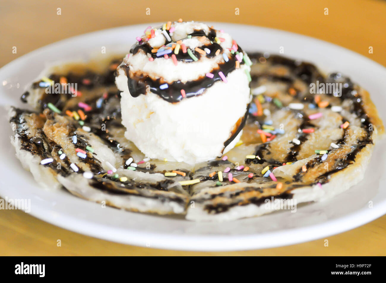 roti with ice cream topping dish Stock Photo - Alamy
