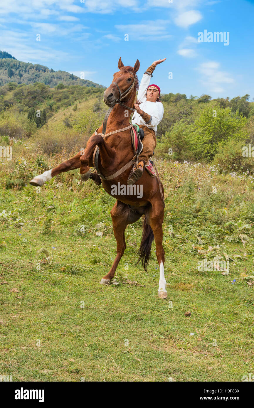 Man on a rearing horse, Kazakh ethnographical village Aul Gunny, Talgar ...
