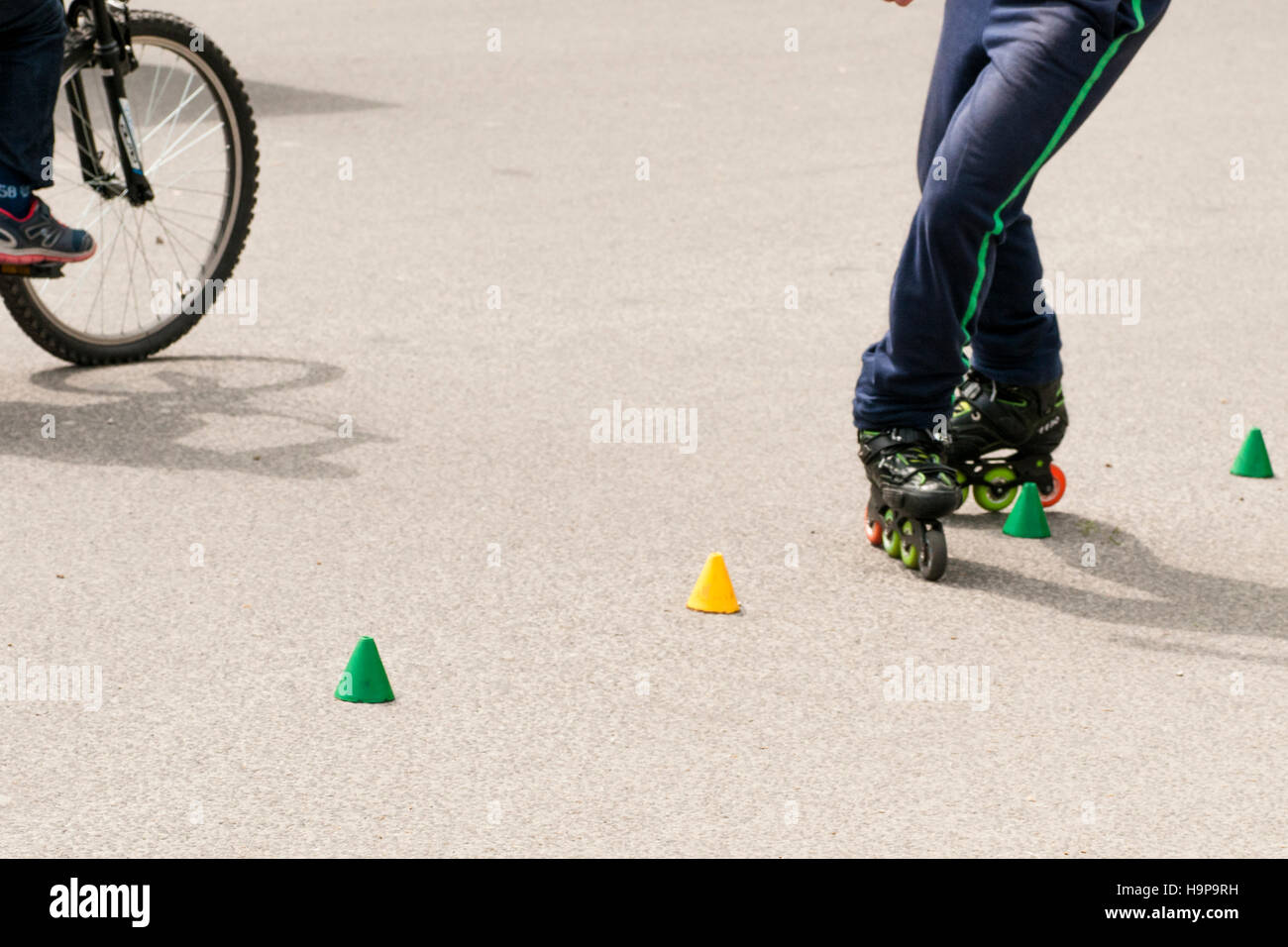 slalom with Inline skates Stock Photo - Alamy