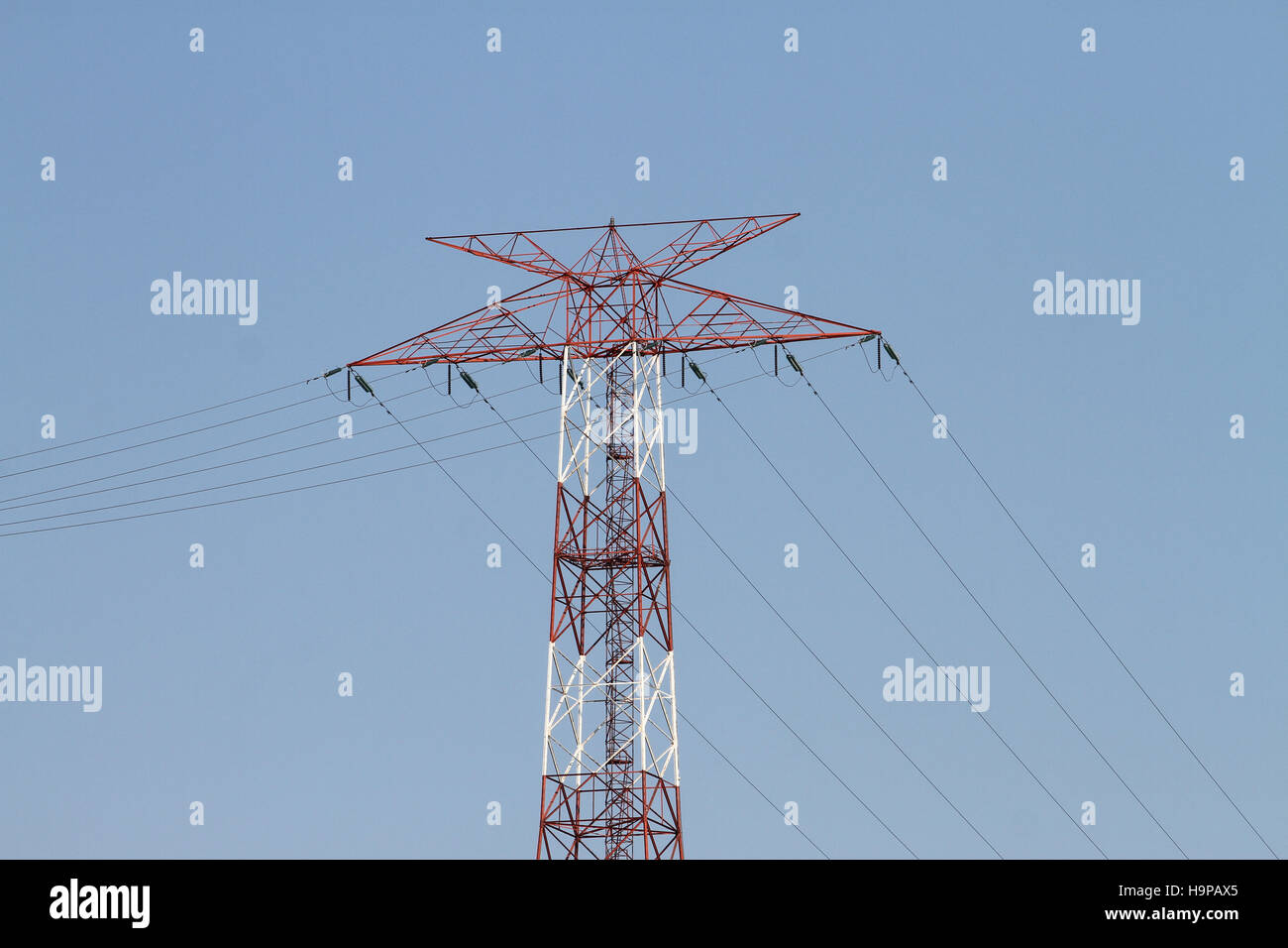 Red and White High Voltage Electric Pole Stock Photo - Alamy