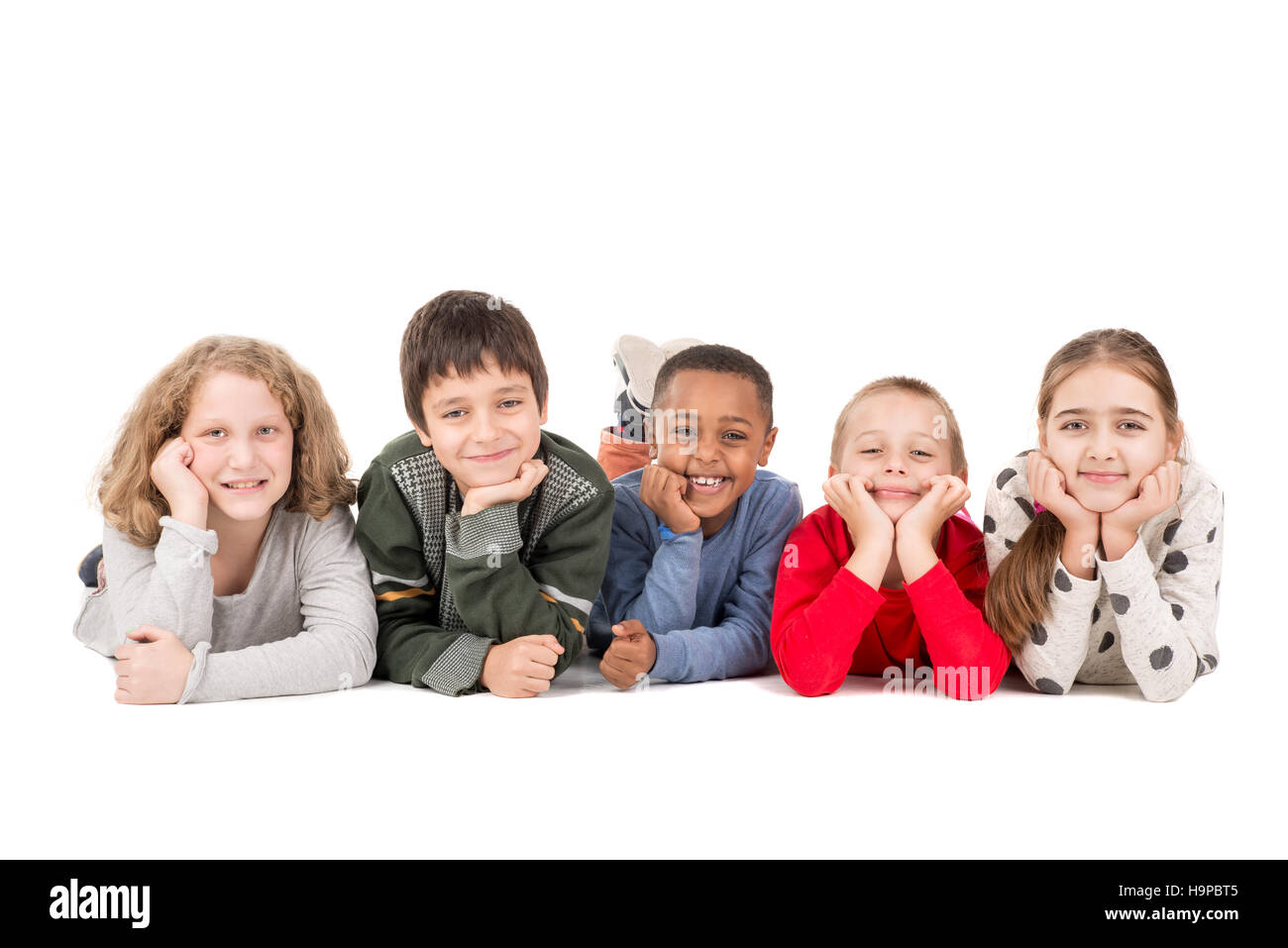 Group of happy children posing isolated in white Stock Photo - Alamy